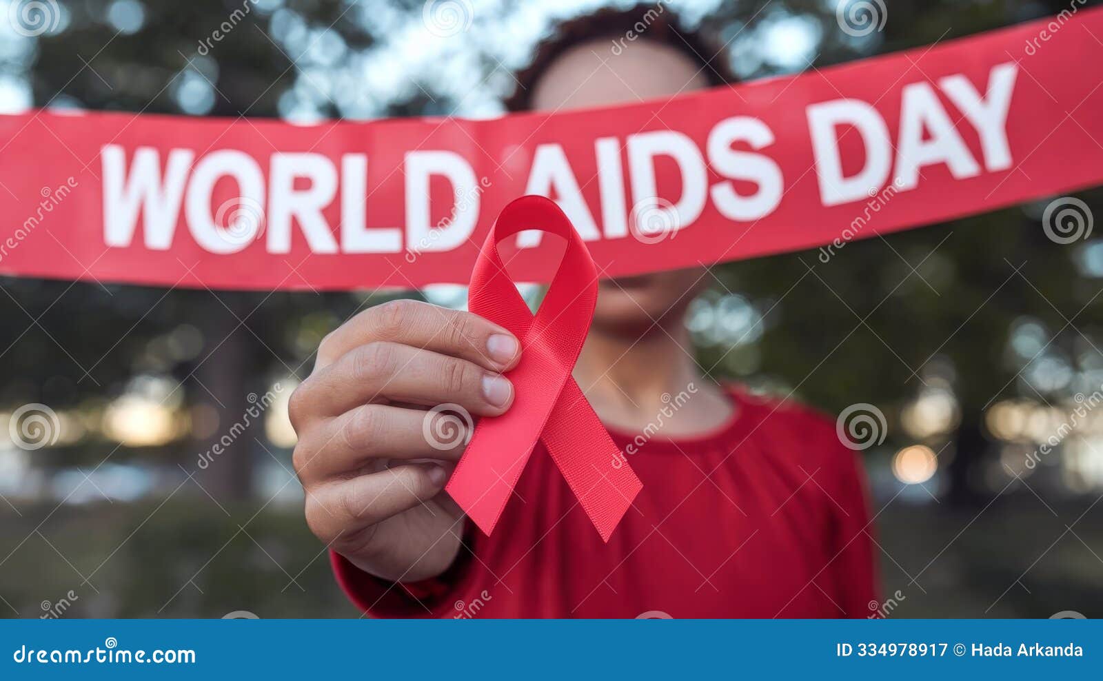 Awareness Campaign for World AIDS Day Featuring Red Ribbon Backdrop ...