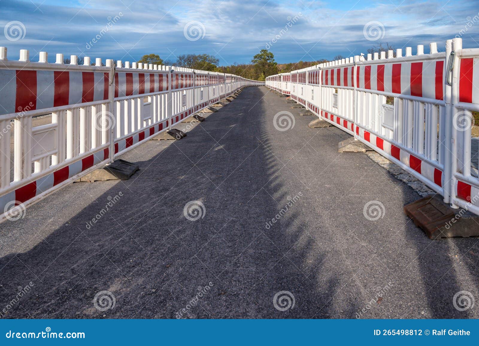 Securing a Large Construction Site with a Plastic Barrier Fence Stock ...