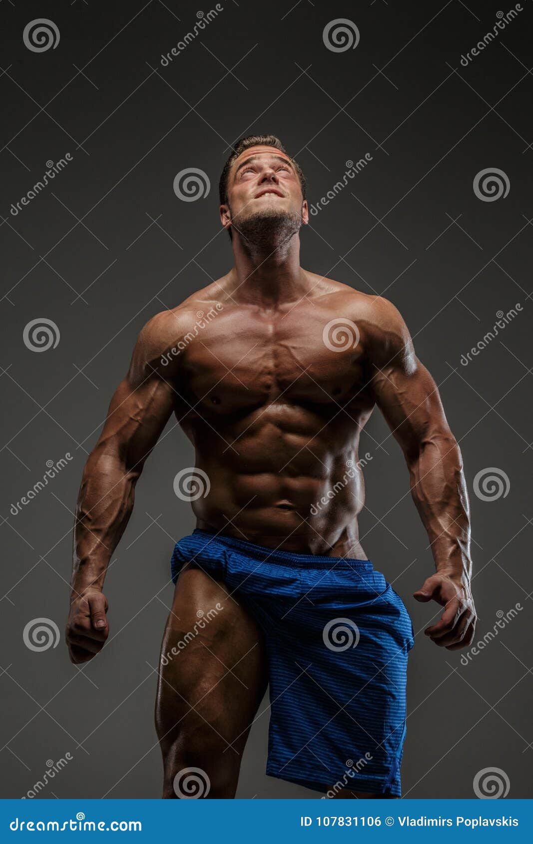 Muscular Guy Posing in Studio Stock Photo - Image of body, biceps ...