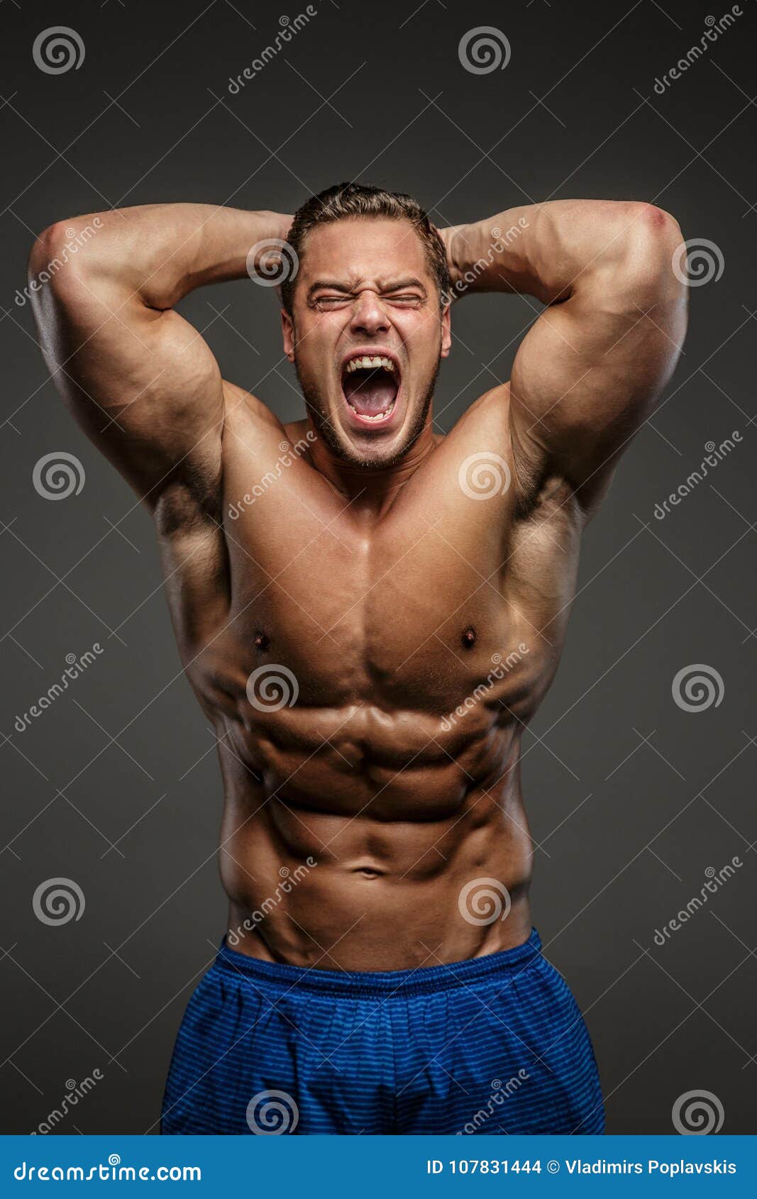 Awesome Muscular Guy on Grey Background Stock Photo - Image of anger ...