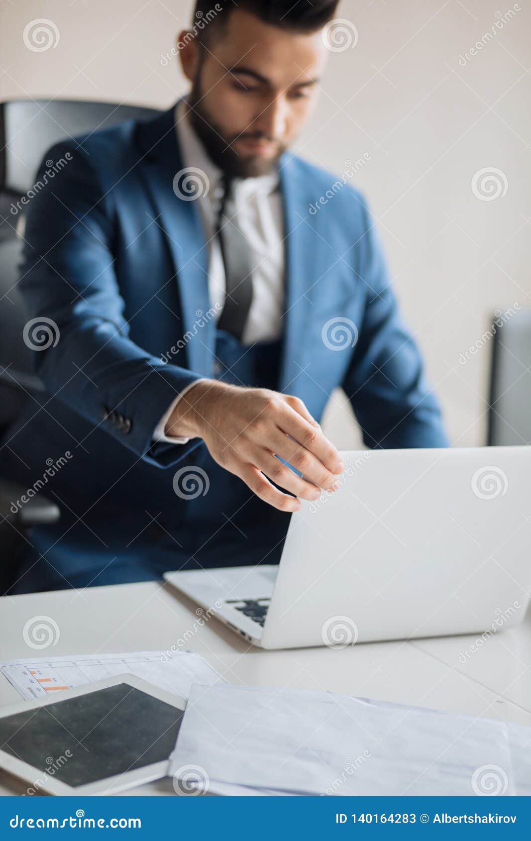 Awesome Office Worker Using the Computer in the Office. Stock Image ...