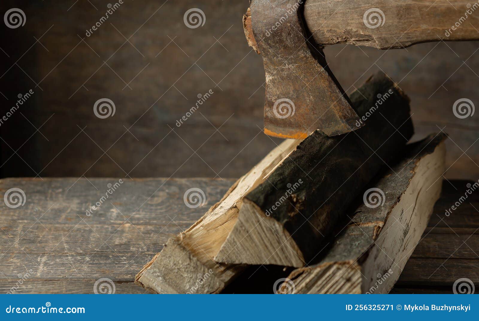 An Ax Is Cut Into A Log Of Firewood For A Firebox On A Wooden Texture ...