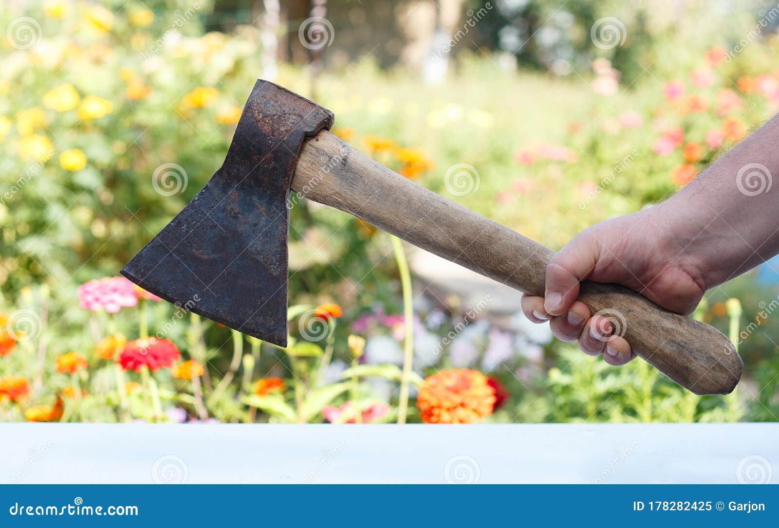 The Ax in His Hand. a Man`s Hand Holds an Axe Stock Image - Image of ...