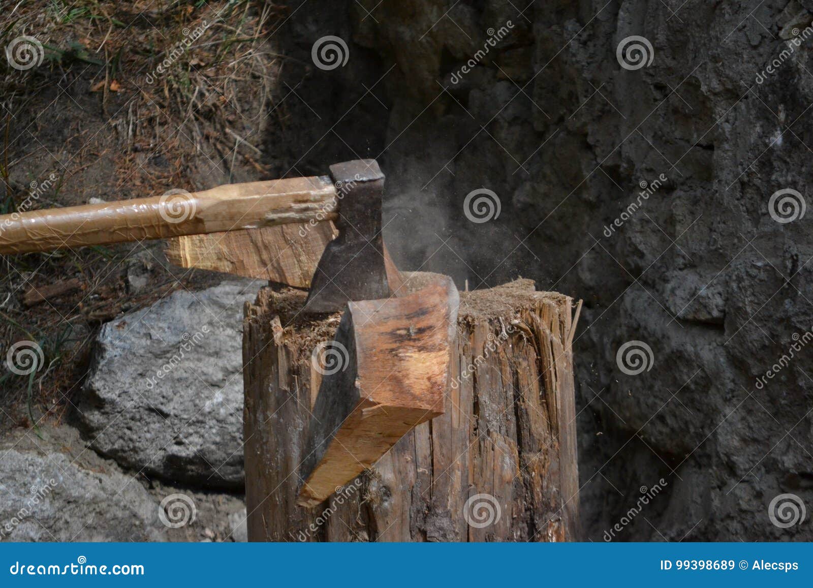 Axe in action cutting wood stock image. Image of burn - 99398689