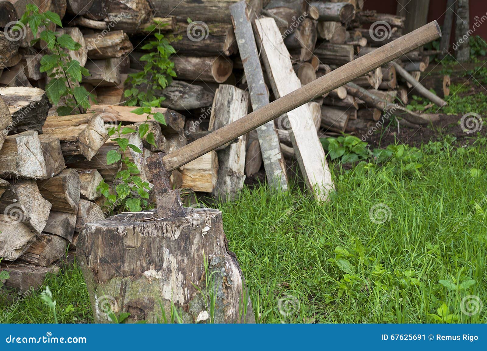 Axe stuck in a log stock image. Image of pile, woodpile - 67625691