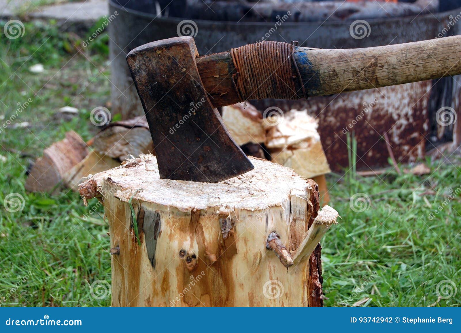 Axe in Wood Log stock photo. Image of physical, outdoors - 93742942