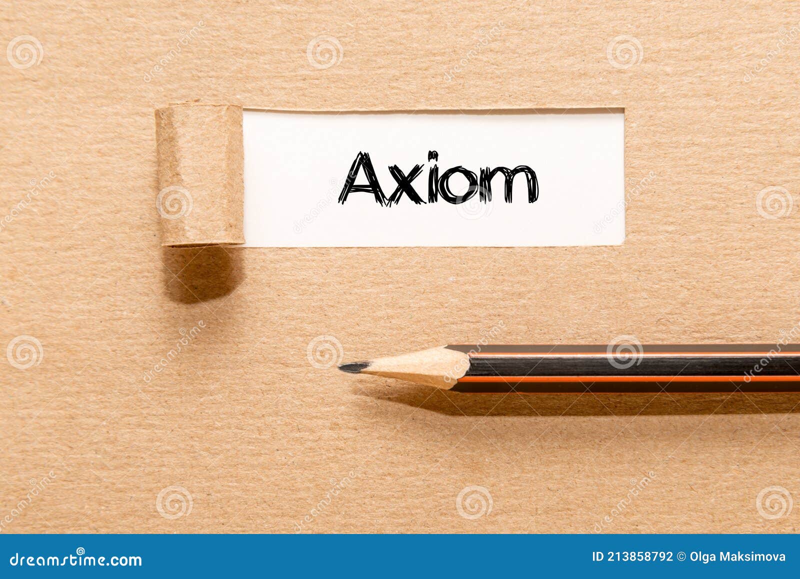 AXIOM, Text on White Paper Appearing Behind Torn Brown Paper and Pencil ...