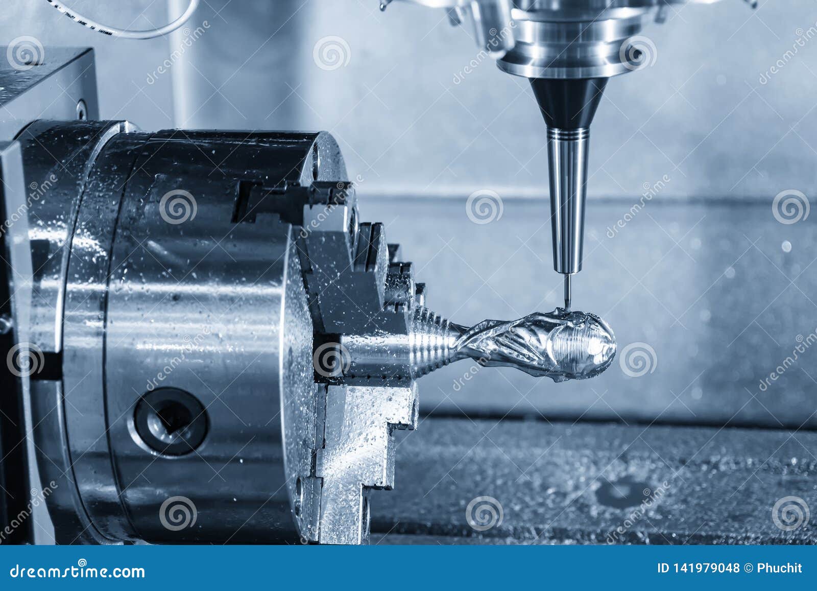 The 5-axis Machining Center Cutting the Sample Part . Stock Photo ...