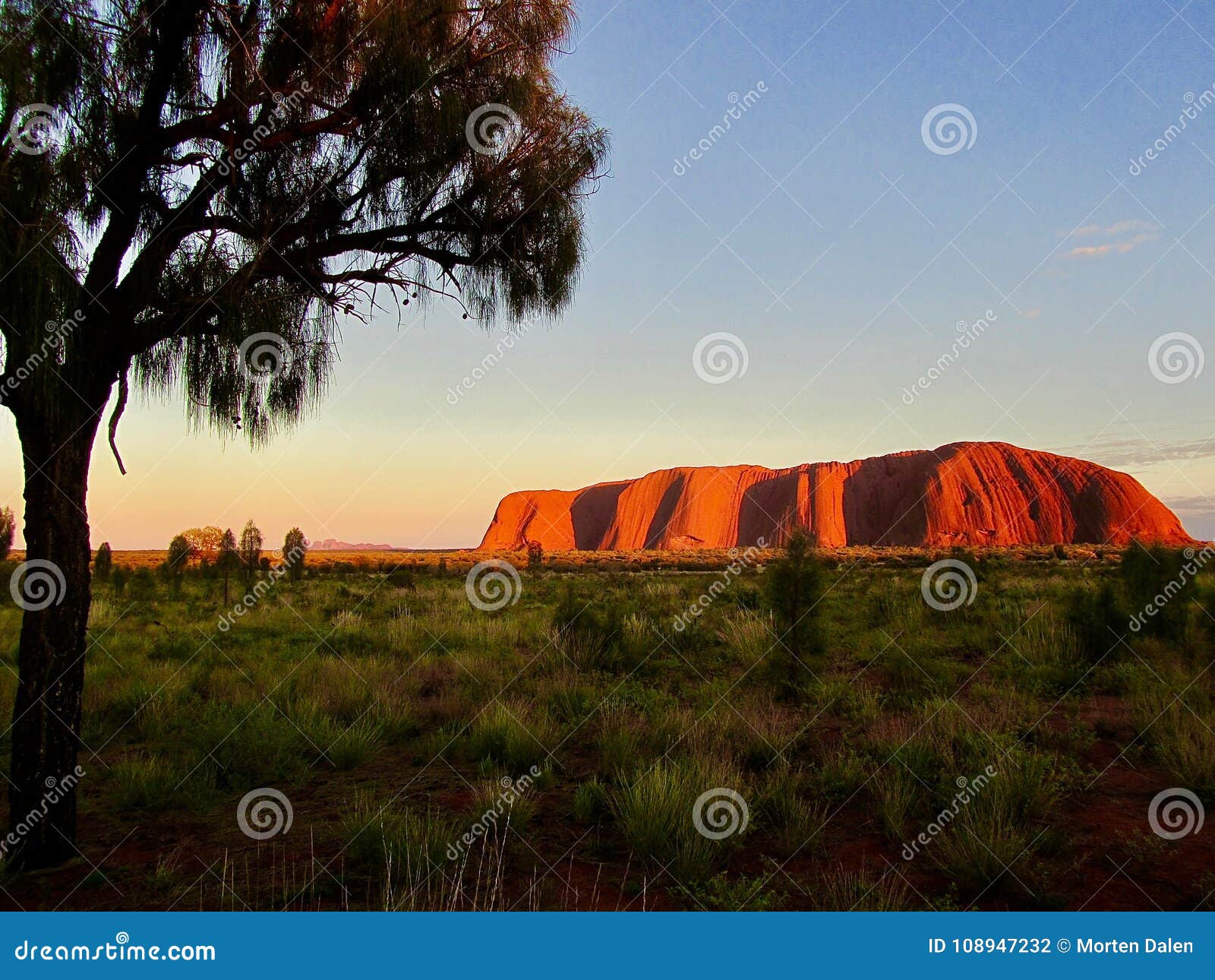 Ayers Rock during sunset editorial photography. Image of beautiful ...