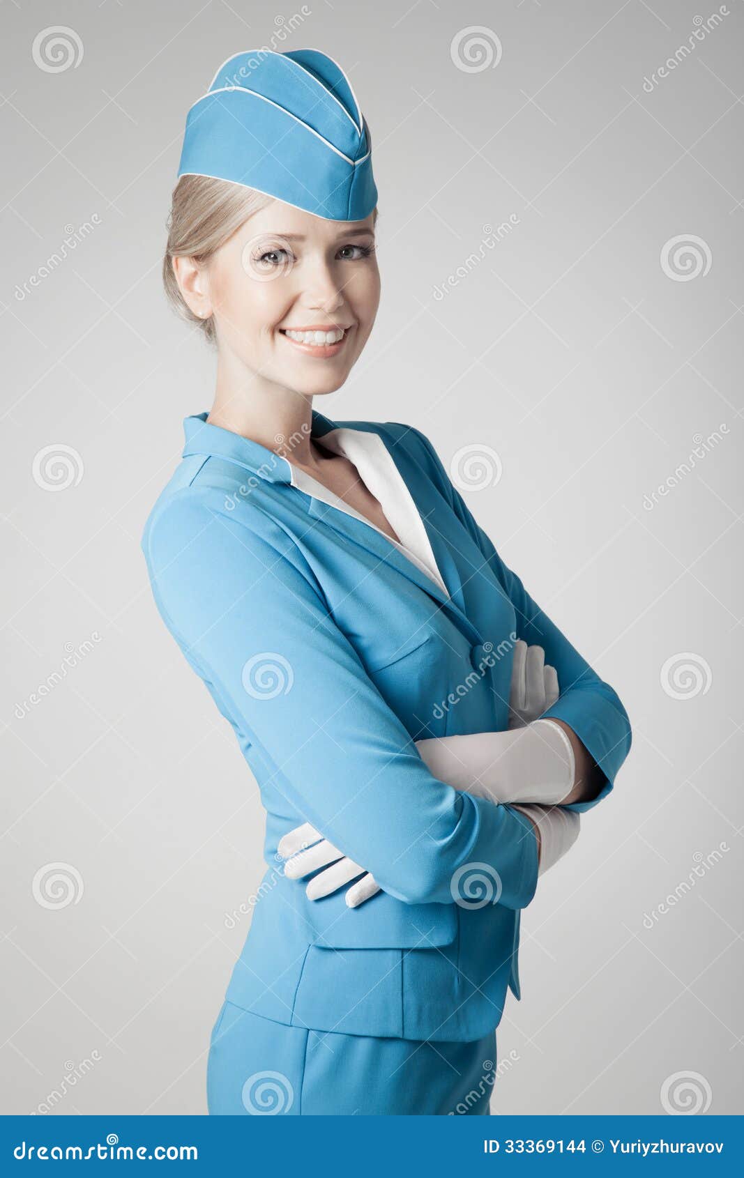 Azafata Encantadora in Blue Uniform En Gray Background Foto de archivo ...