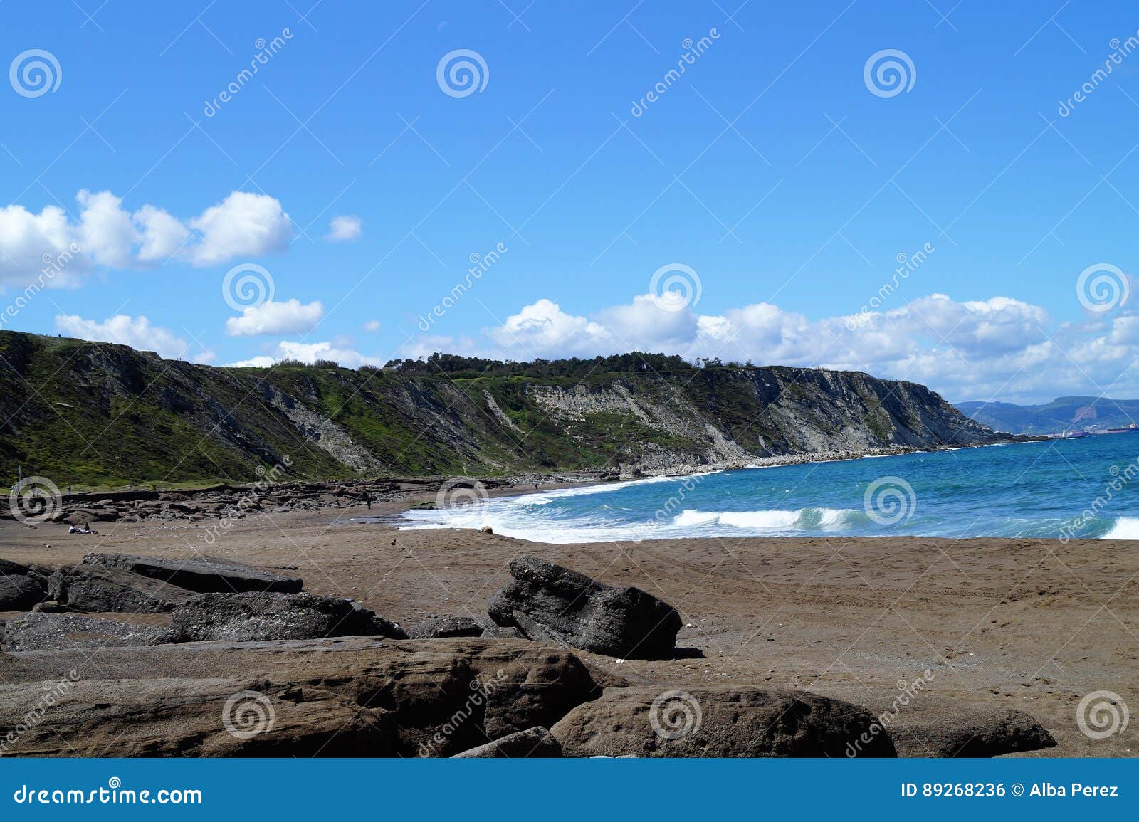 Azkorri beach stock photo. Image of cliffs, water, sand - 89268236