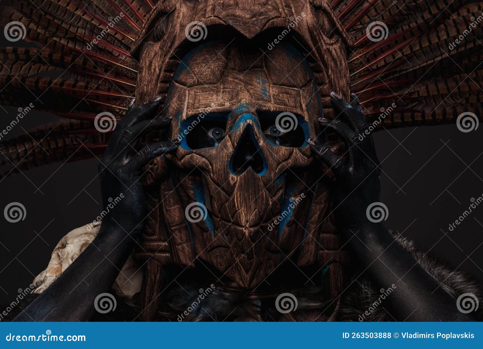 Aztec Voodoo Witch with Mask Against Grey Background Stock Photo ...