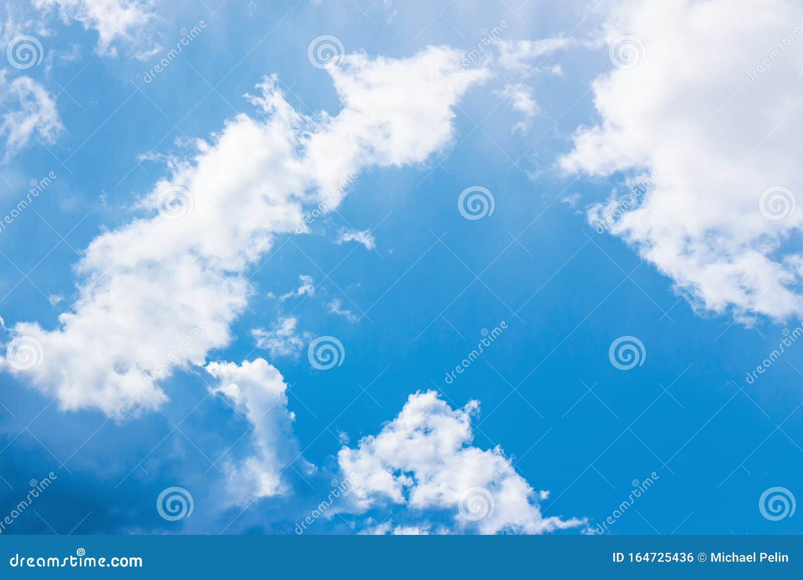 Azure Sky with Puffy Clouds Stock Photo - Image of clouds, azure: 164725436
