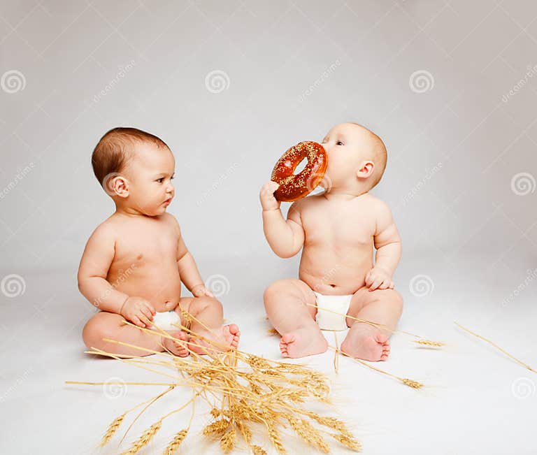 Babies with bread stock photo. Image of basket, healthy - 12754704