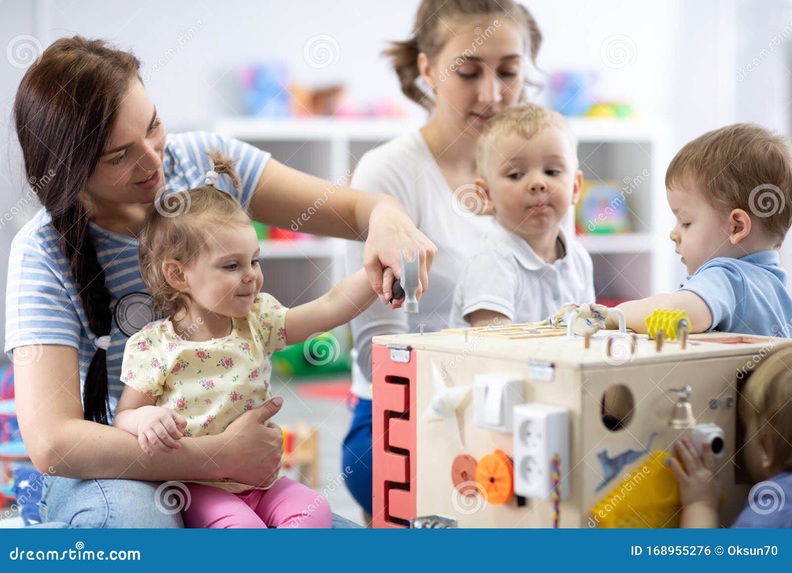 Babies Group Playing in Day Care Centre or Nursery Stock Photo - Image ...