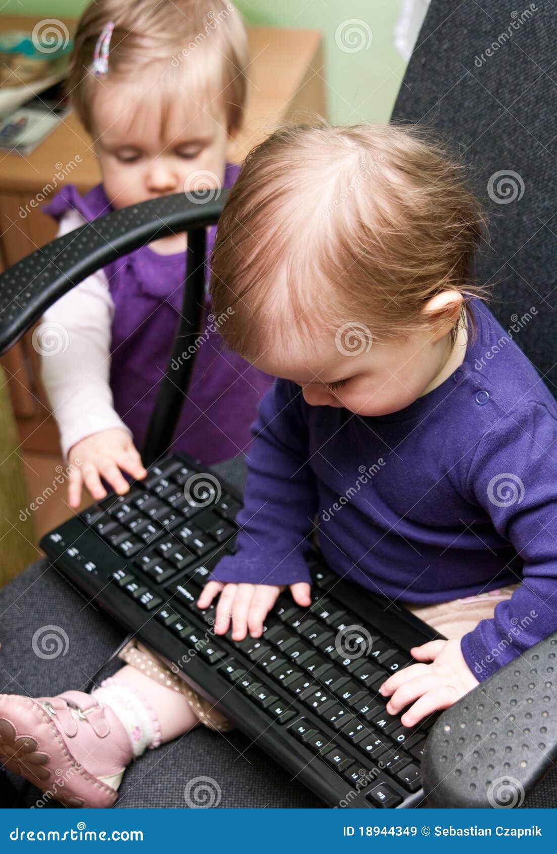 Babies with keyboard stock image. Image of computers - 18944349