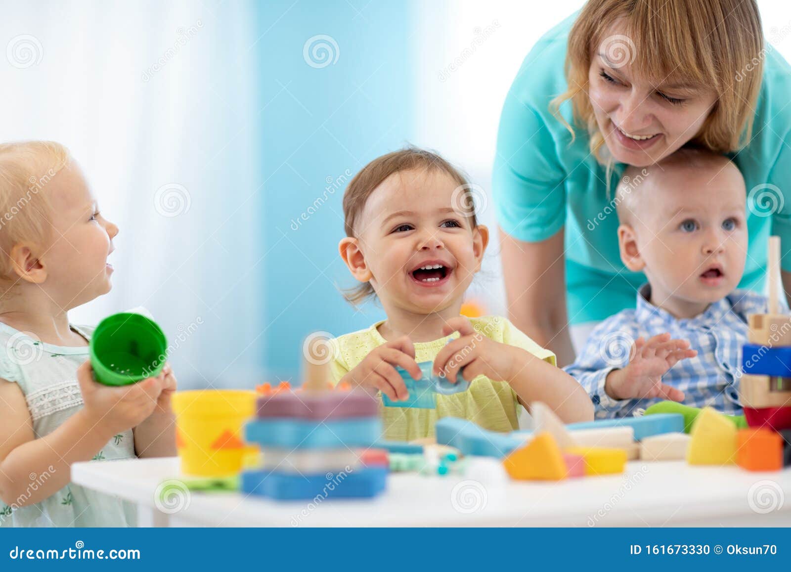 Babies Play with Teacher in Nursery Stock Photo - Image of learning ...