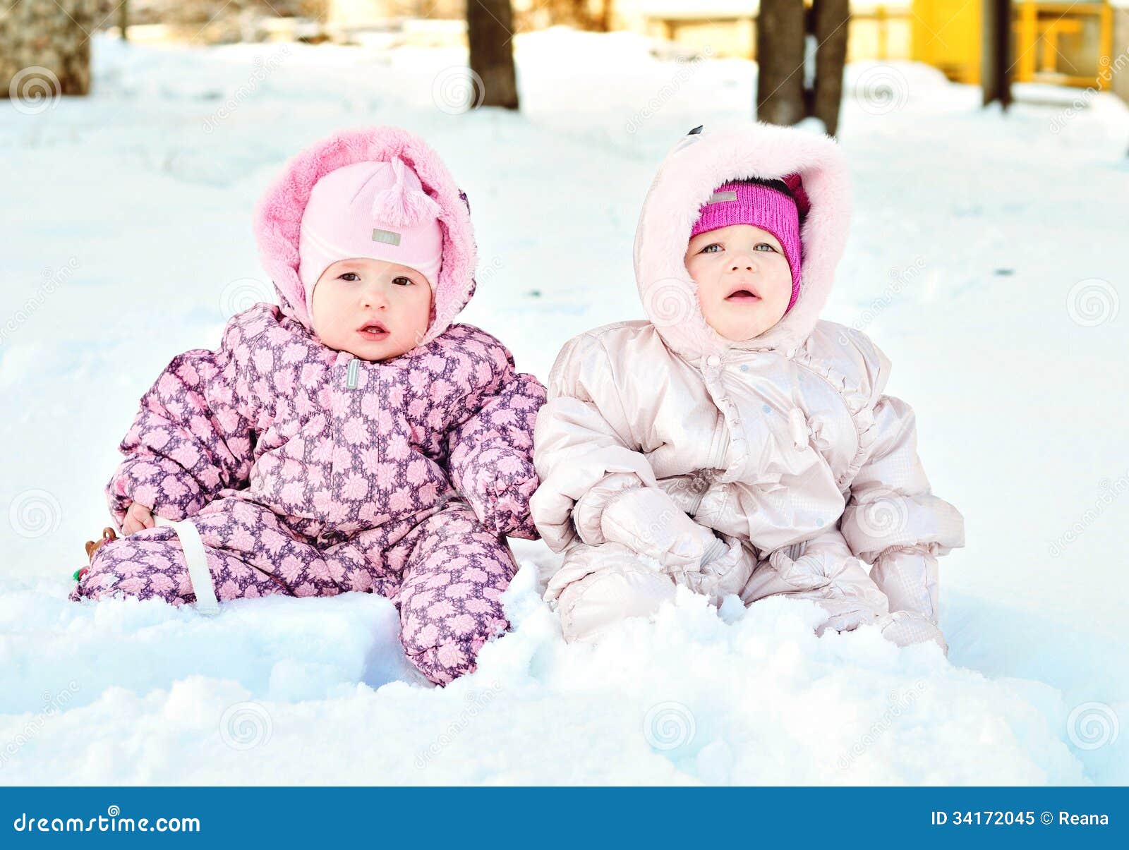 Babies in snow stock image. Image of outside, friendship - 34172045