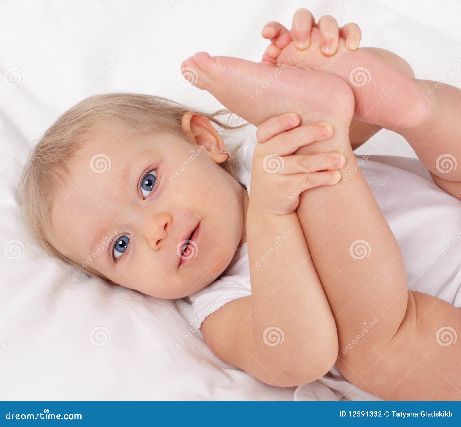 Baby stock photo. Image of barefoot, bedroom, expressing - 12591332