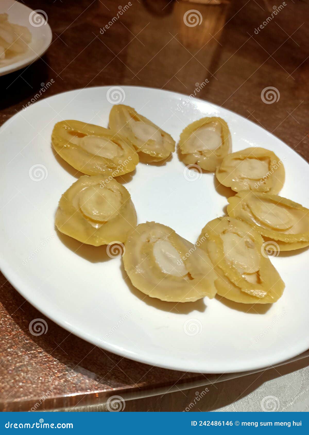 Baby abalone. Cook abalone stock photo. Image of plant - 242486146