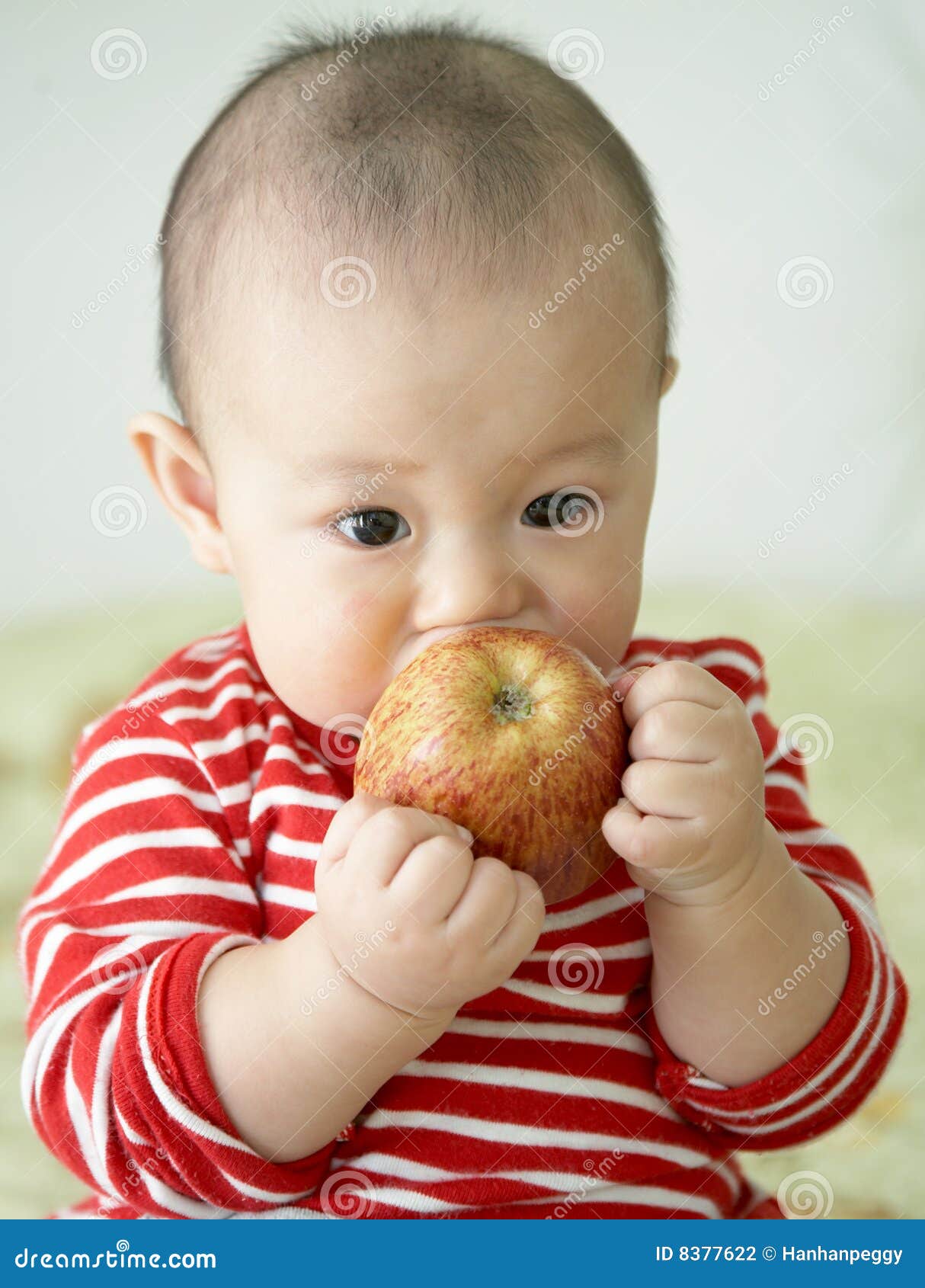 Baby and apple stock photo. Image of innocent, asian, face - 8377622