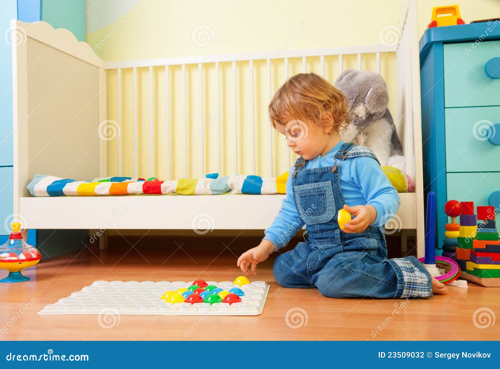 Baby assemble a mosaic stock photo. Image of preschool - 23509032