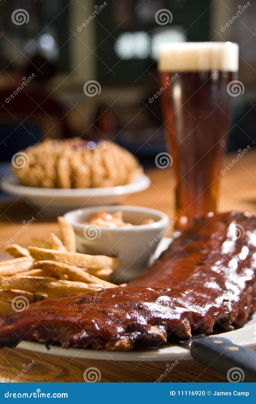Baby back ribs with fries stock photo. Image of vertical - 11116920