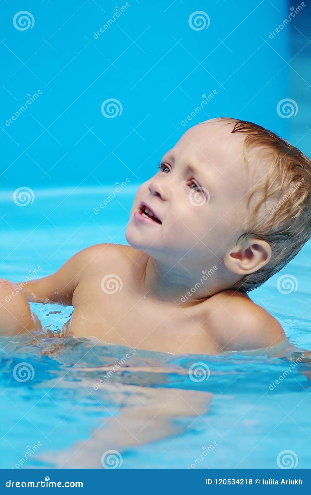 Baby Bathing Fun in the Pool Stock Photo - Image of vacation, childhood ...