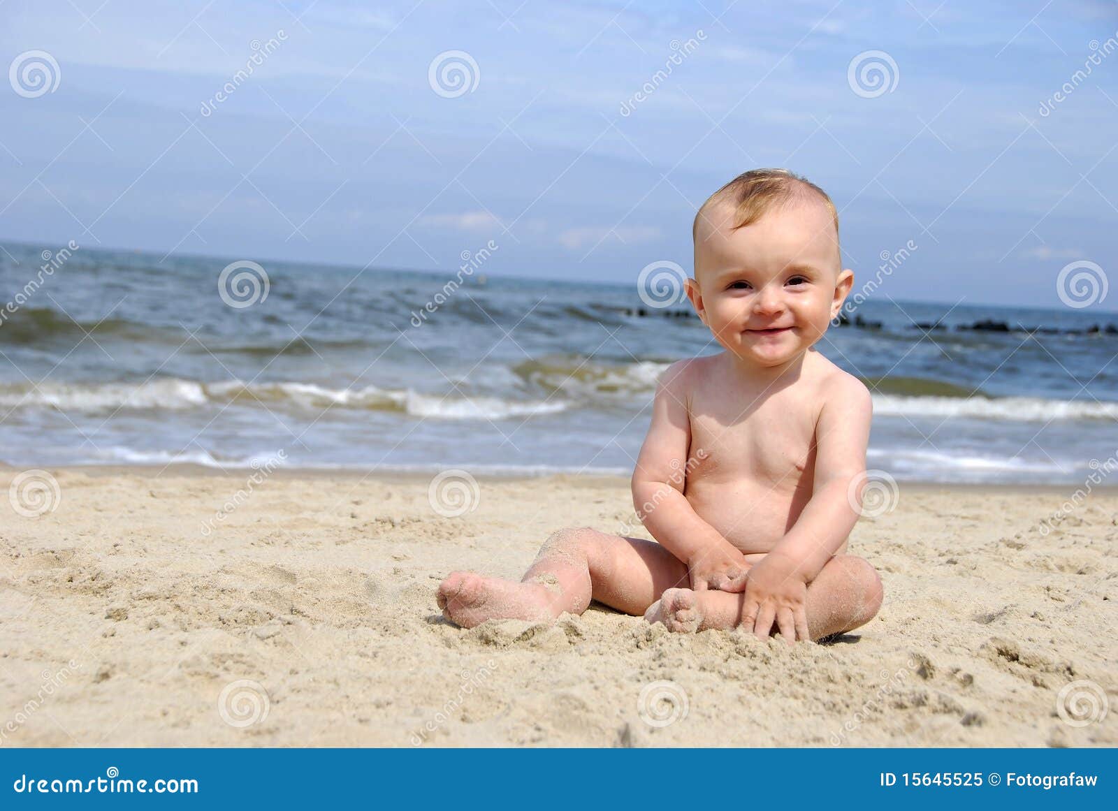 Baby on the beach stock image. Image of water, skin, play - 15645525