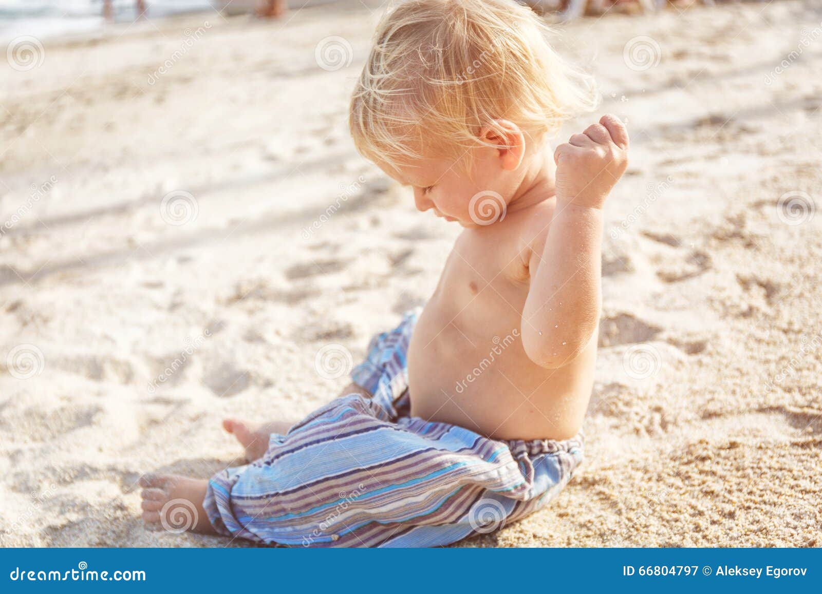 Baby on a beach stock image. Image of thailand, playing - 66804797