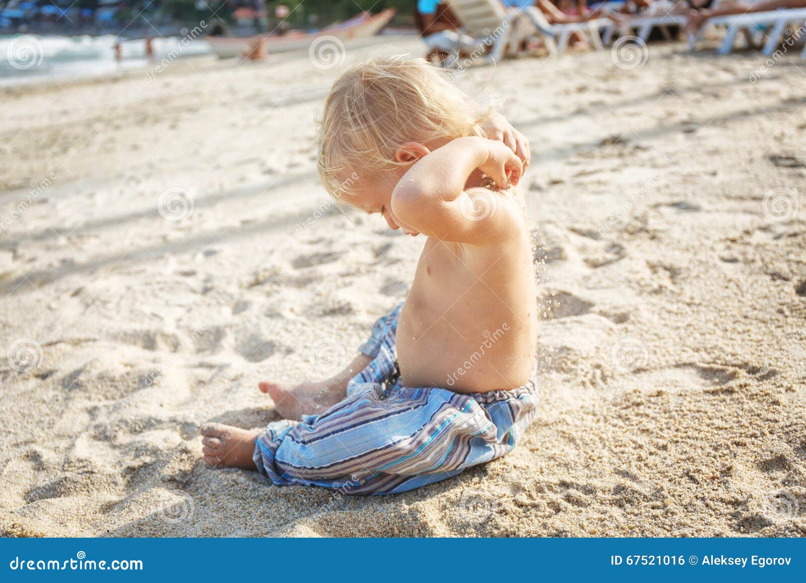 Baby on a beach stock photo. Image of childhood, enjoyment - 67521016