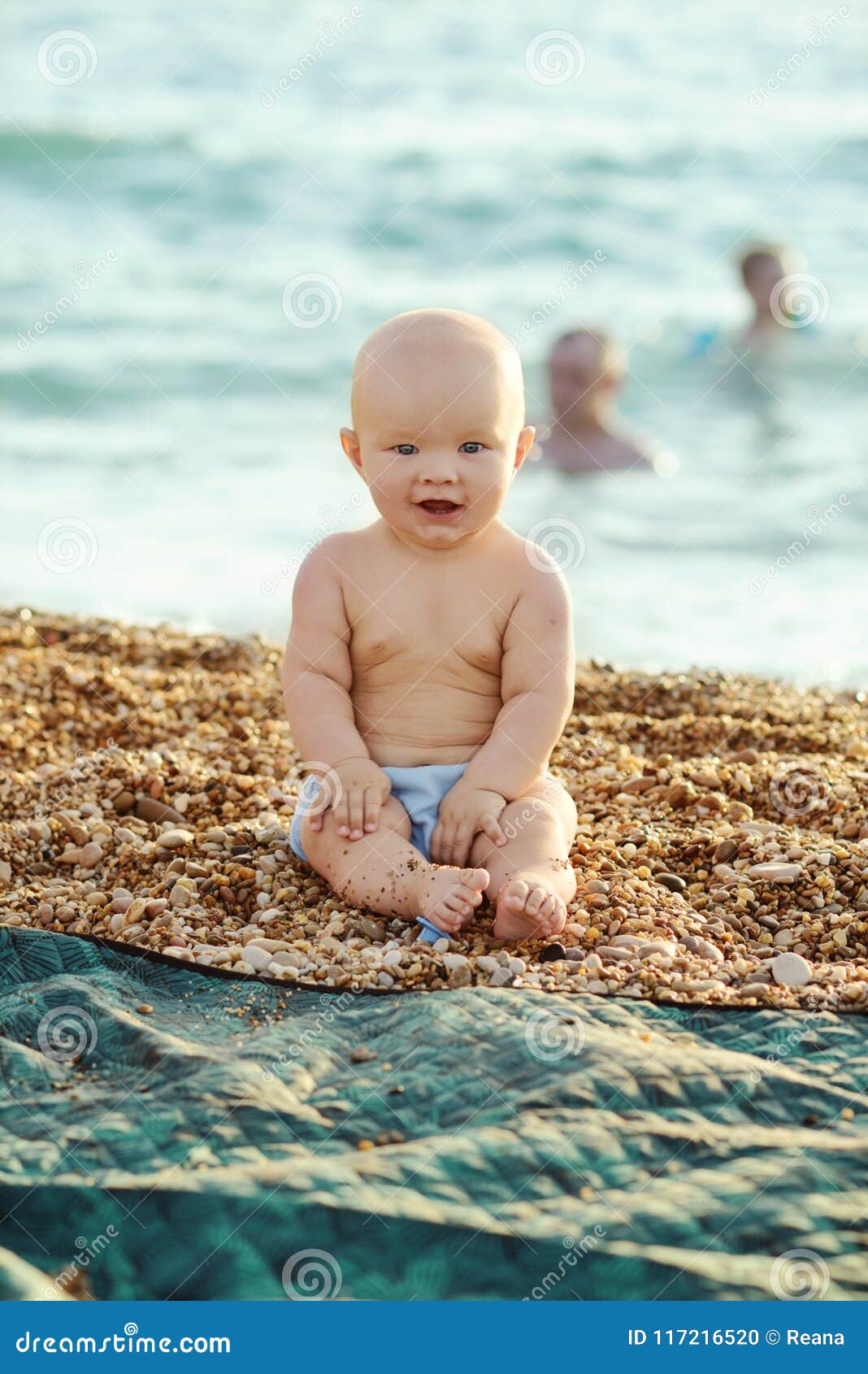 Baby on the beach stock photo. Image of person, lifestyle - 117216520