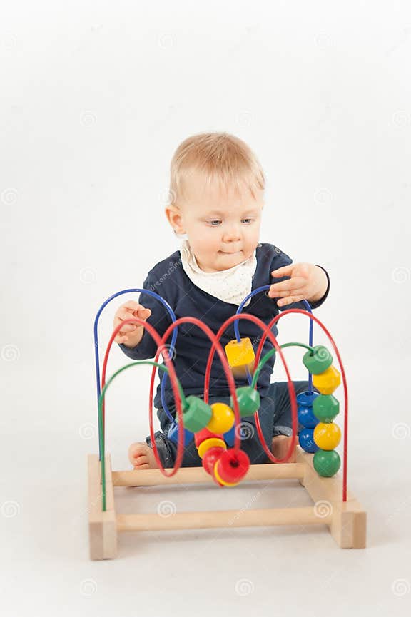Baby with Bead Toy stock image. Image of learning, 1215 - 30938539