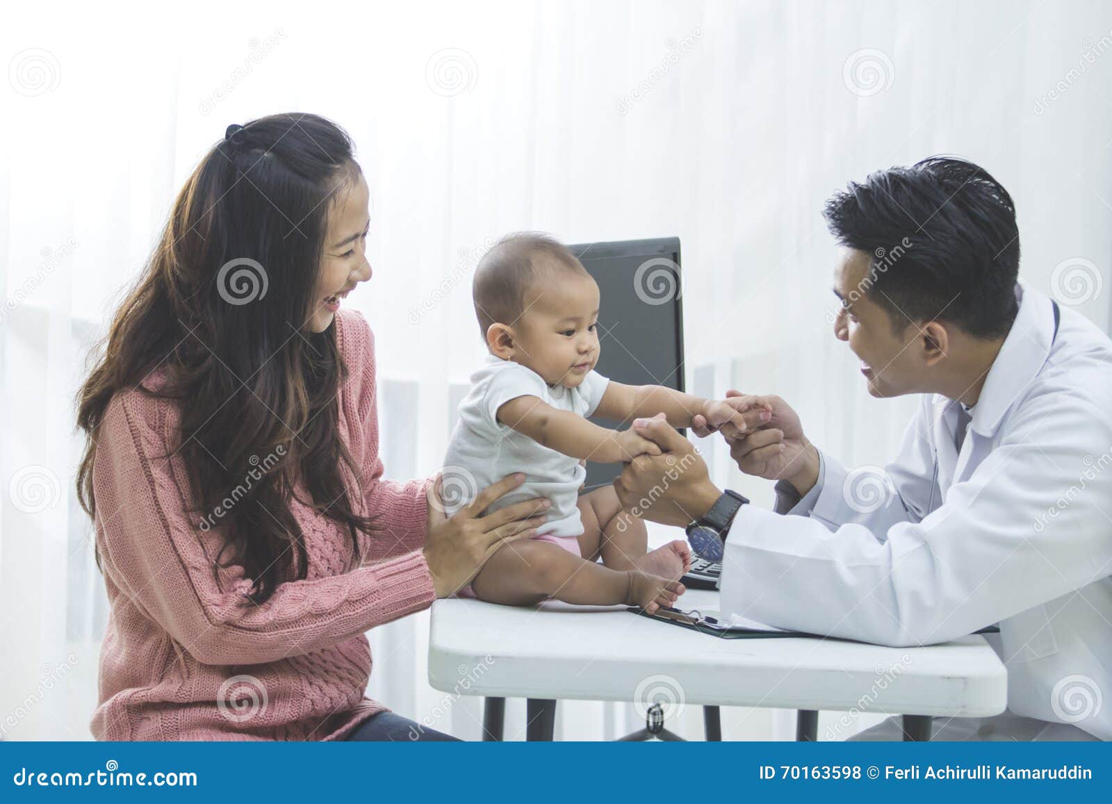 Baby Being Checked by a Doctor Stock Photo - Image of robe, healing ...