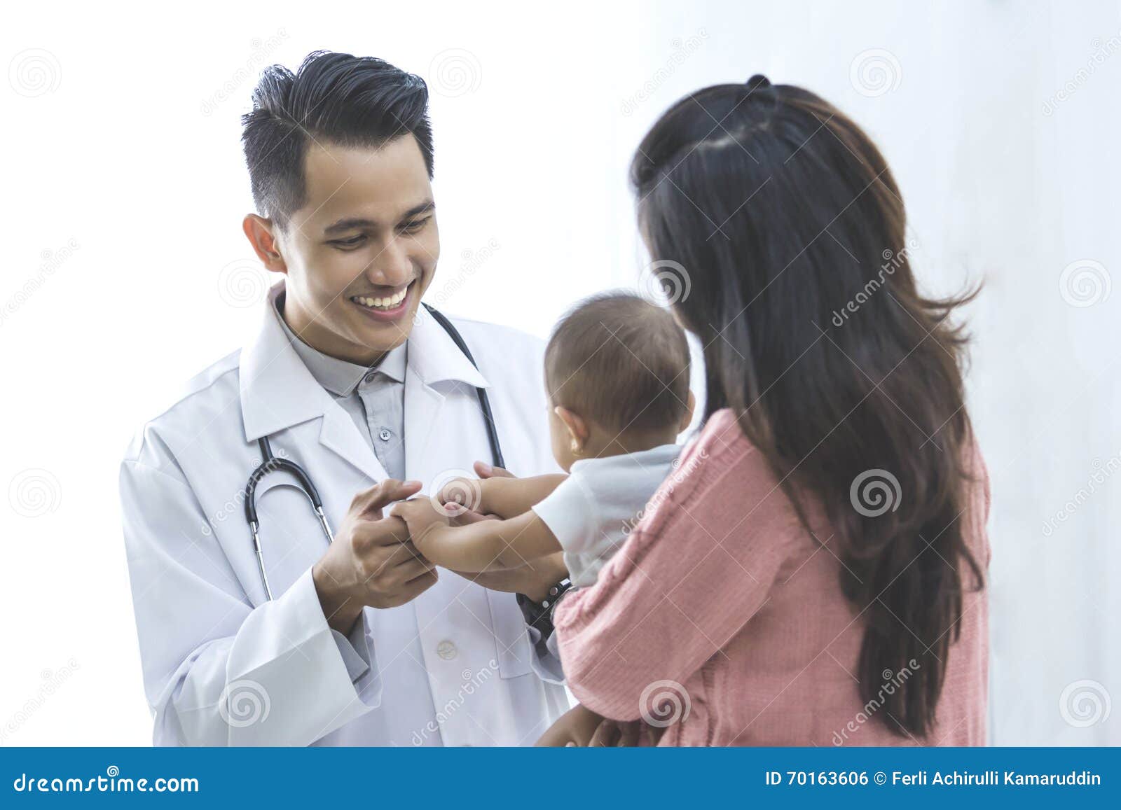 Baby Being Checked by a Doctor Stock Photo - Image of carefree, health ...
