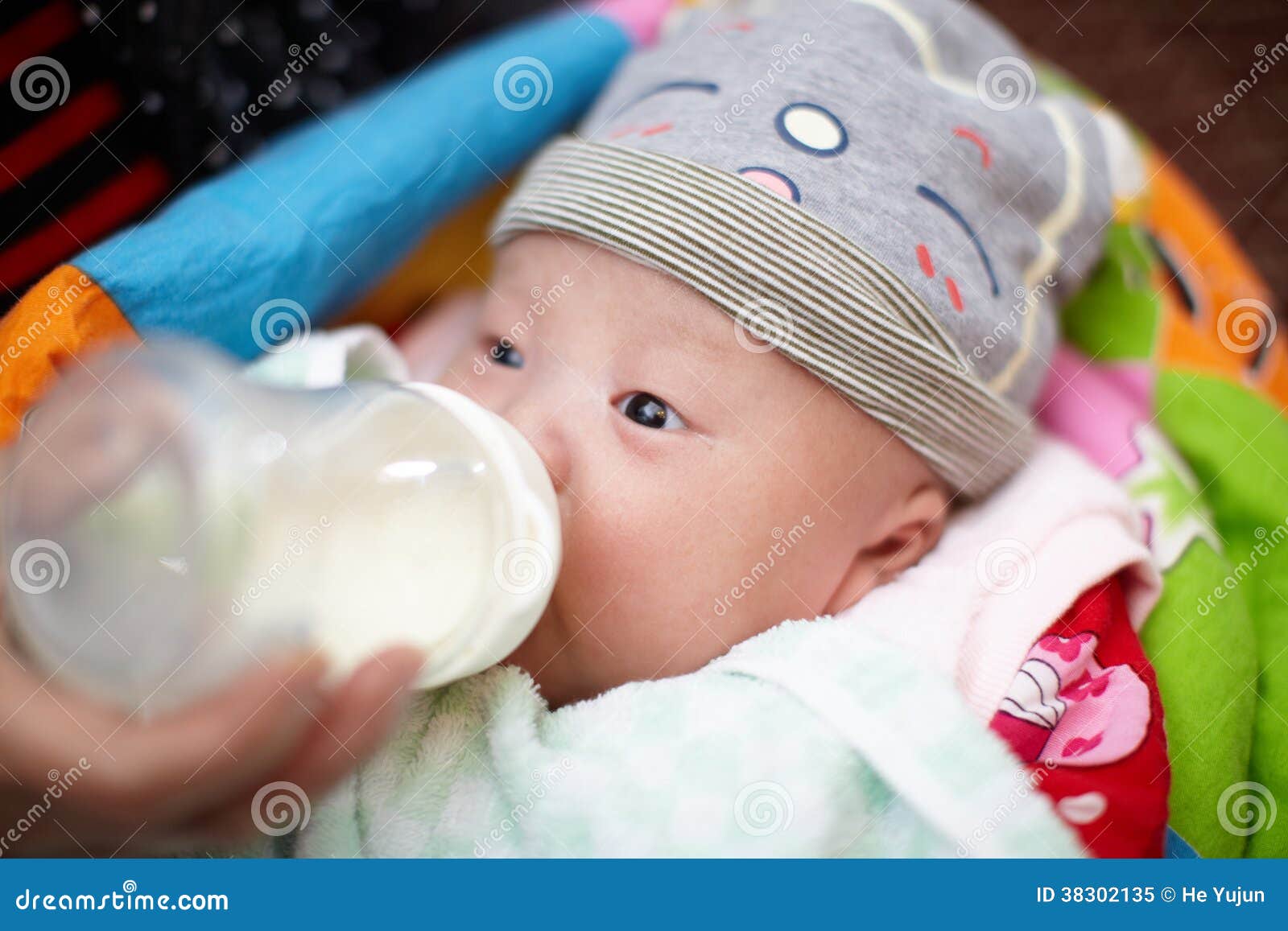 Baby being fed stock image. Image of love, month, drink - 38302135