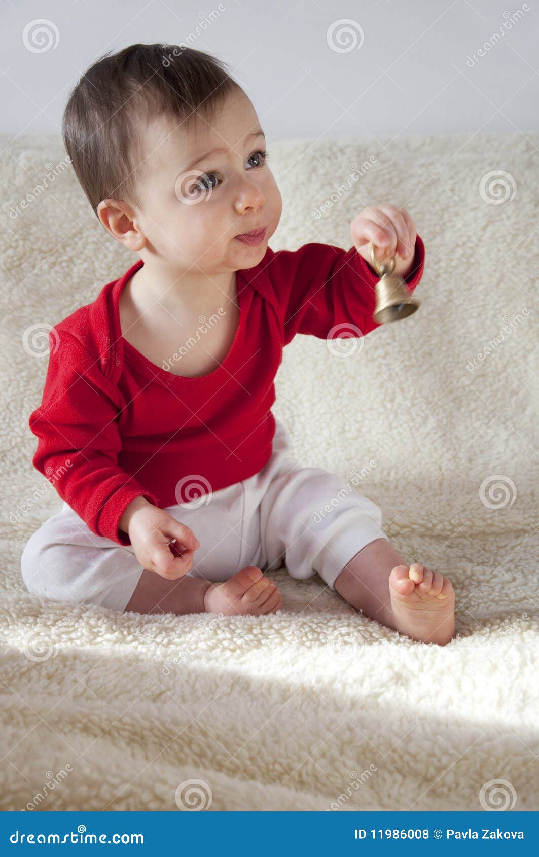 Baby with bell stock photo. Image of little, face, bell - 11986008