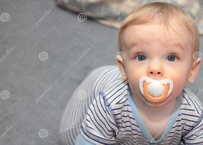 Baby and Binky stock photo. Image of expression, alert - 17215490