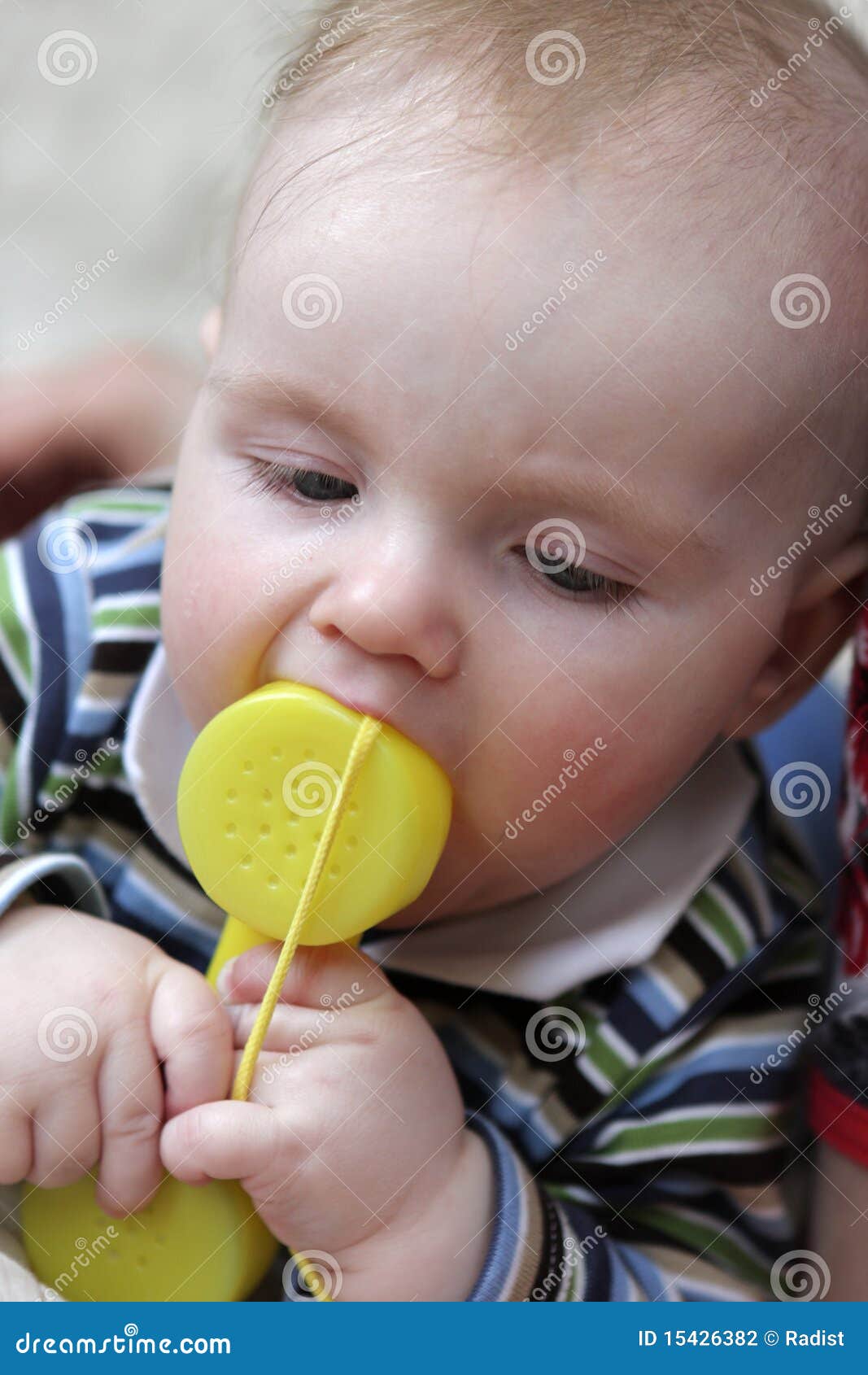Baby bites phone stock photo. Image of person, telephone - 15426382