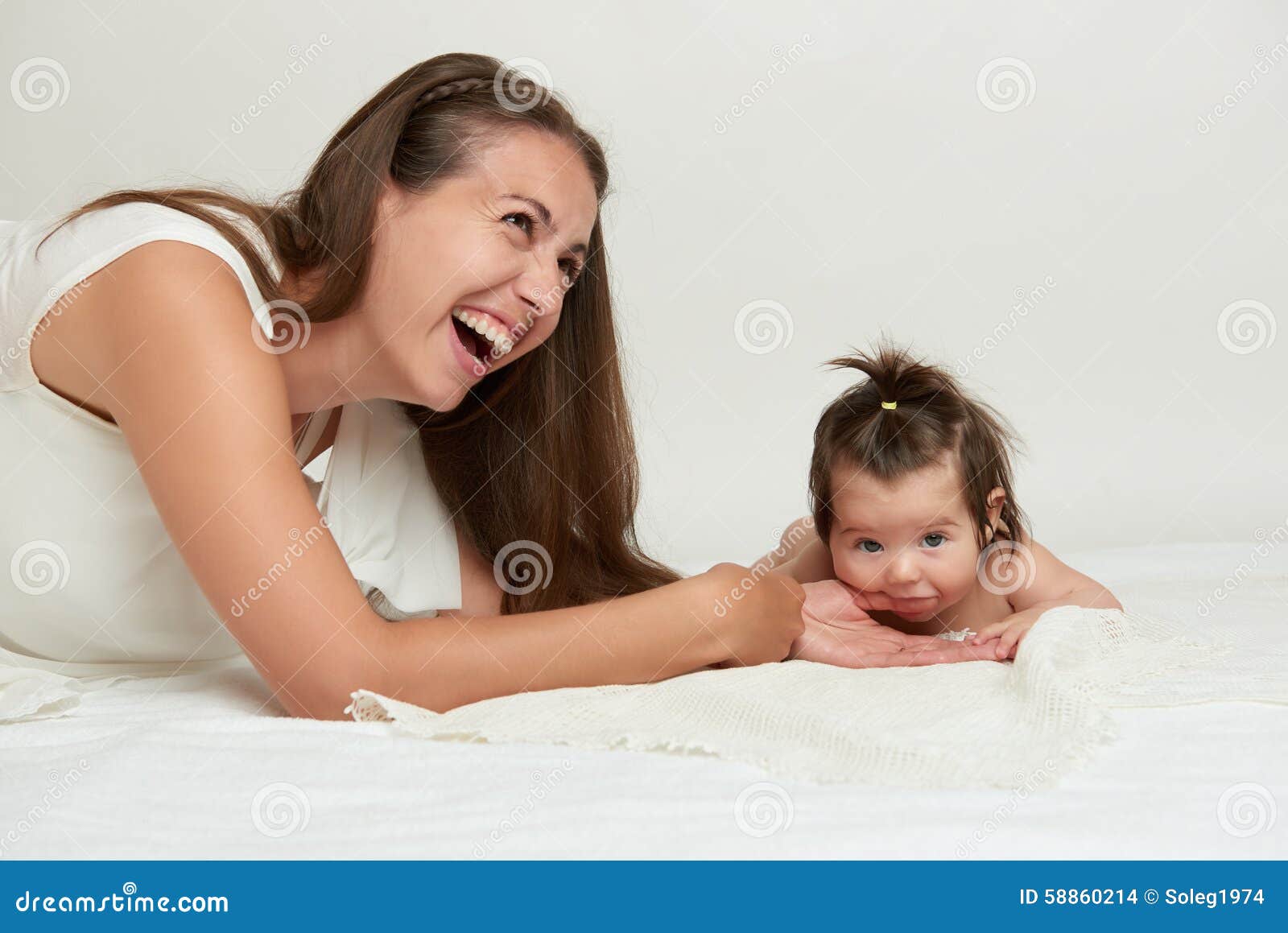 Baby biting finger mother stock photo. Image of natural - 58860214