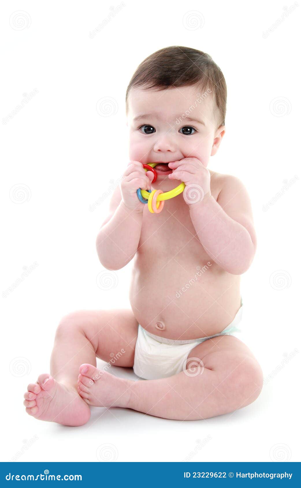 Baby biting teething ring stock photo. Image of isolated - 23229622
