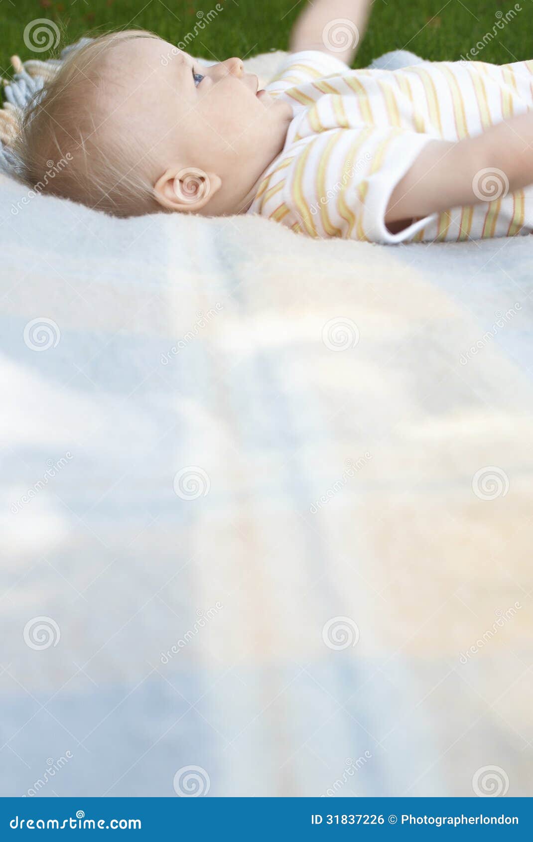 Baby on Blanket Outdoors stock photo. Image of infant - 31837226