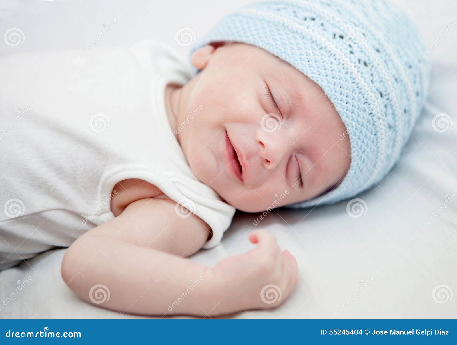 Baby with Blue Cap Sleeping Peacefully Stock Photo - Image of happy ...