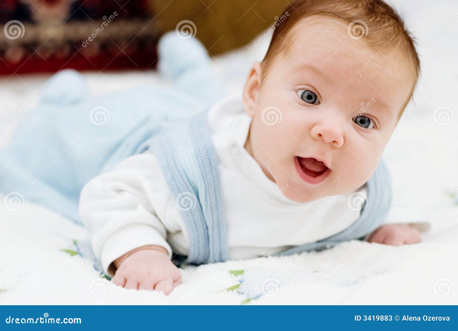 Baby in blue toddlers stock image. Image of mouth, face - 3419883