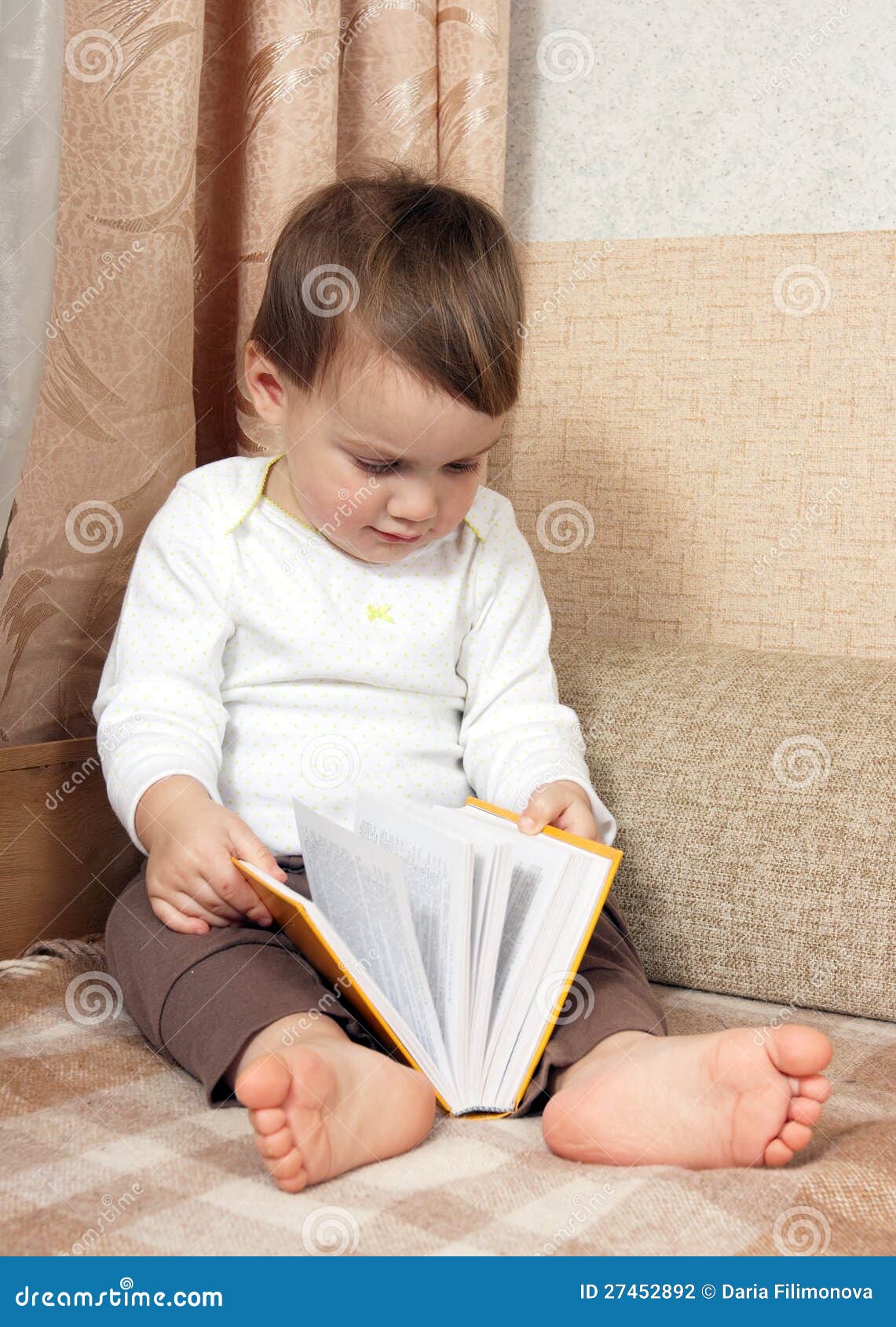 Baby with a book stock photo. Image of holding, daughter - 27452892