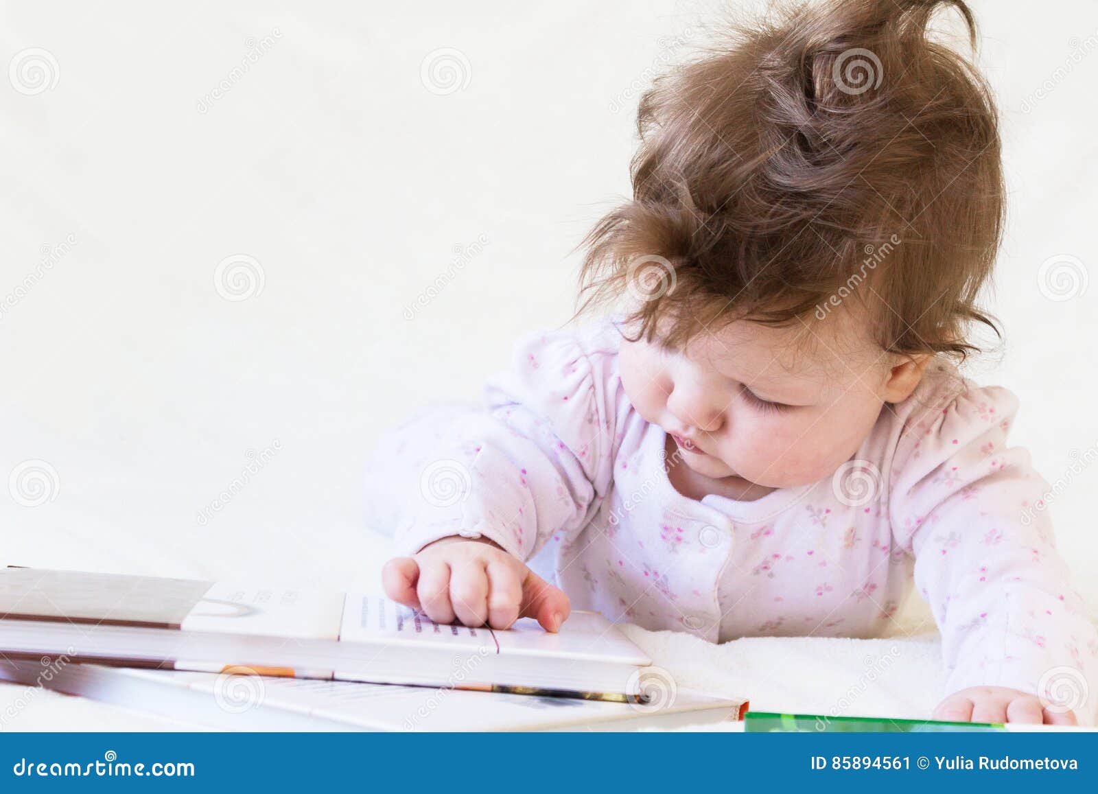 A baby with books. stock image. Image of small, girl - 85894561