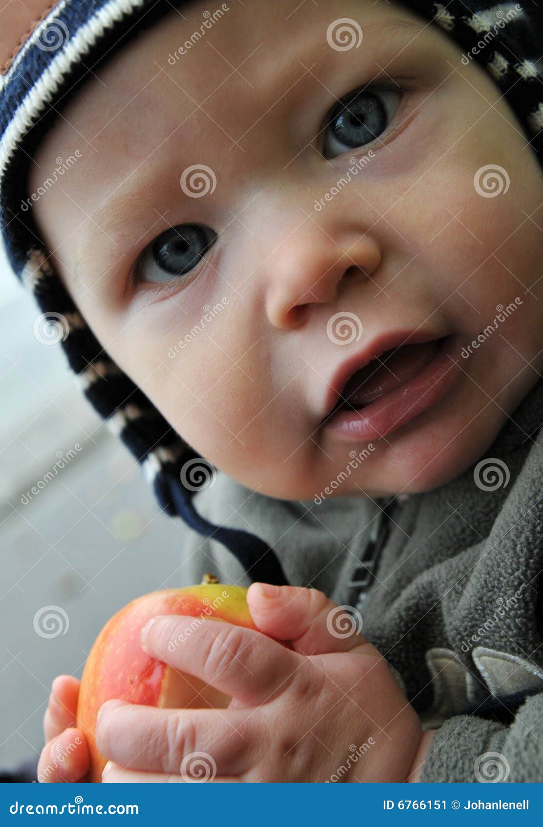Baby boy with an apple stock image. Image of taste, eating - 6766151