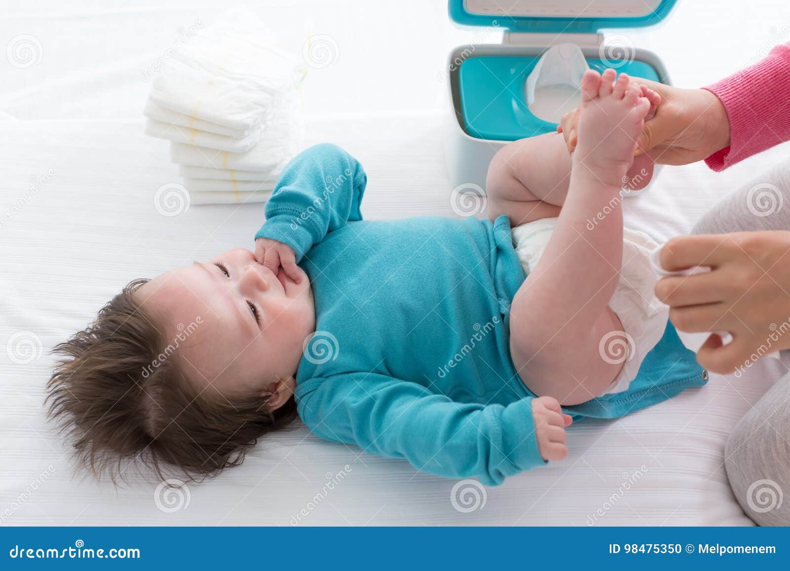 Baby Boy Being Cared for by His Mother Stock Photo - Image of little ...