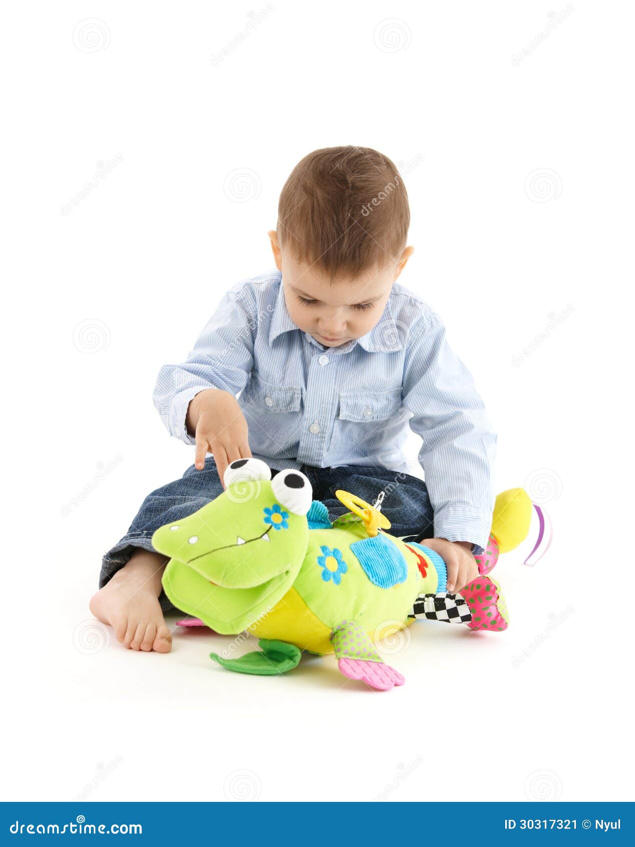 Baby boy busy playing stock image. Image of developmental - 30317321