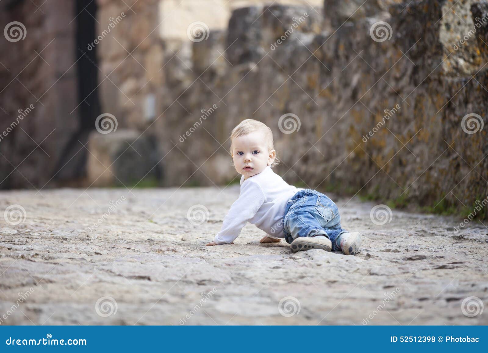 Baby Boy Crawling on Stone Paved Sidewalk Stock Photo - Image of ...